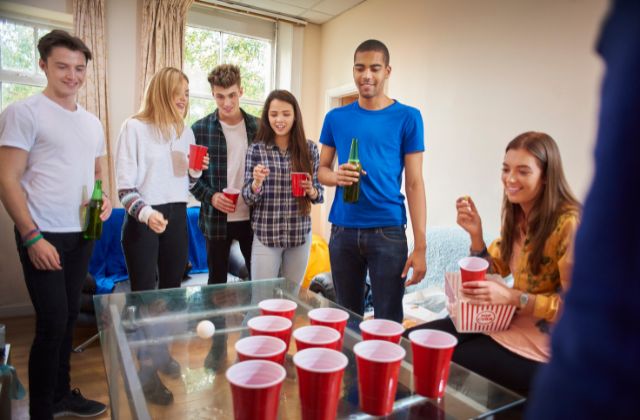How To Play Beer Pong: Beer Pong Rules & Game Play - Slosh Spot